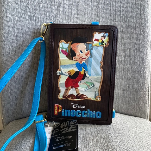 Loungefly | Bags | Nwt Lougefly Disney Classic Book Pinocchio Cross ...